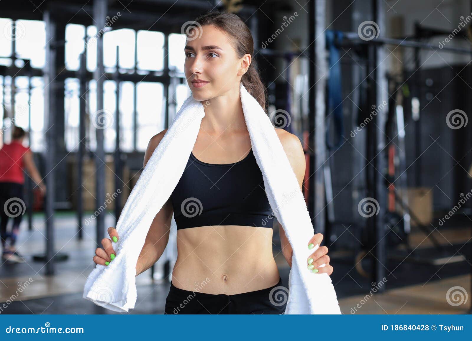 Female Athlete Preparing for a Workout in a Gym Stock Photo - Image of ...
