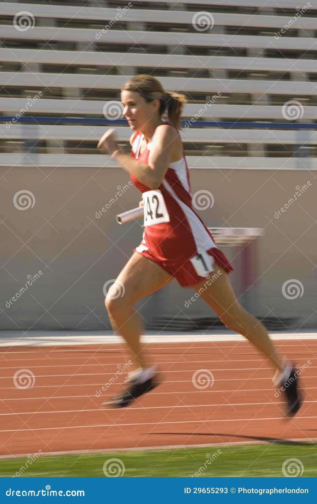 Female Athlete Running with Baton Stock Image - Image of confidence ...