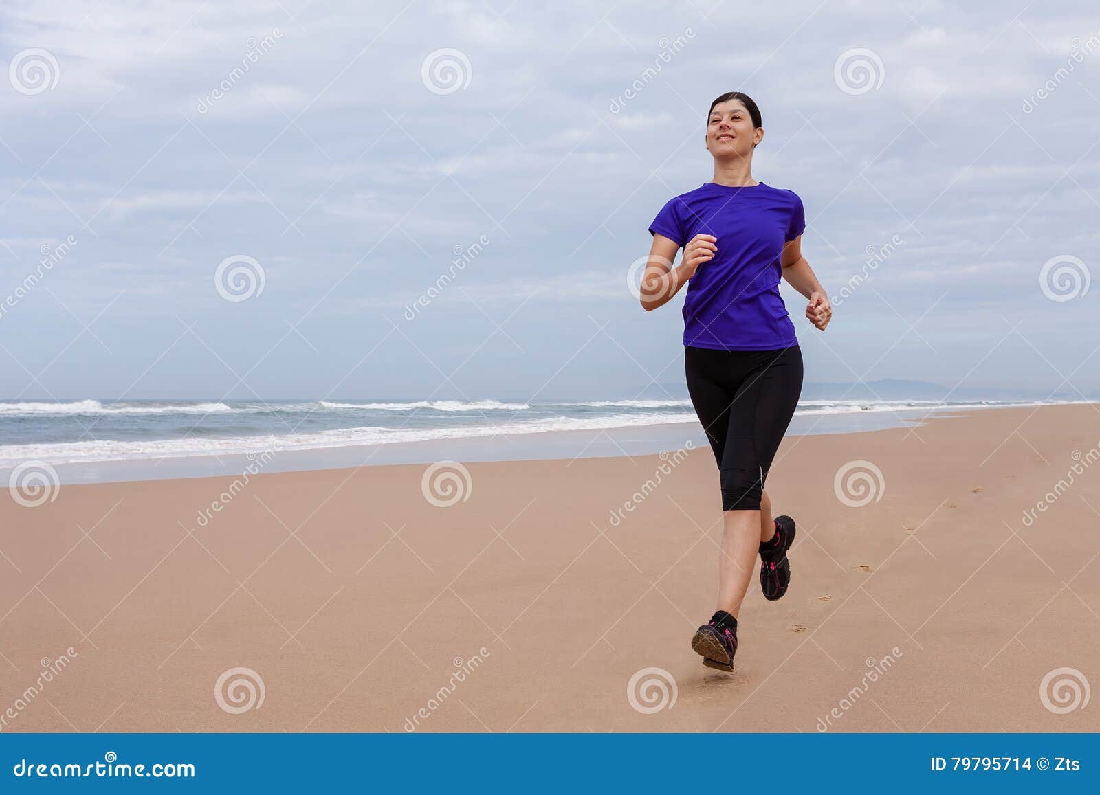 Female Athlete Running at the Beach Stock Photo - Image of outdoors ...