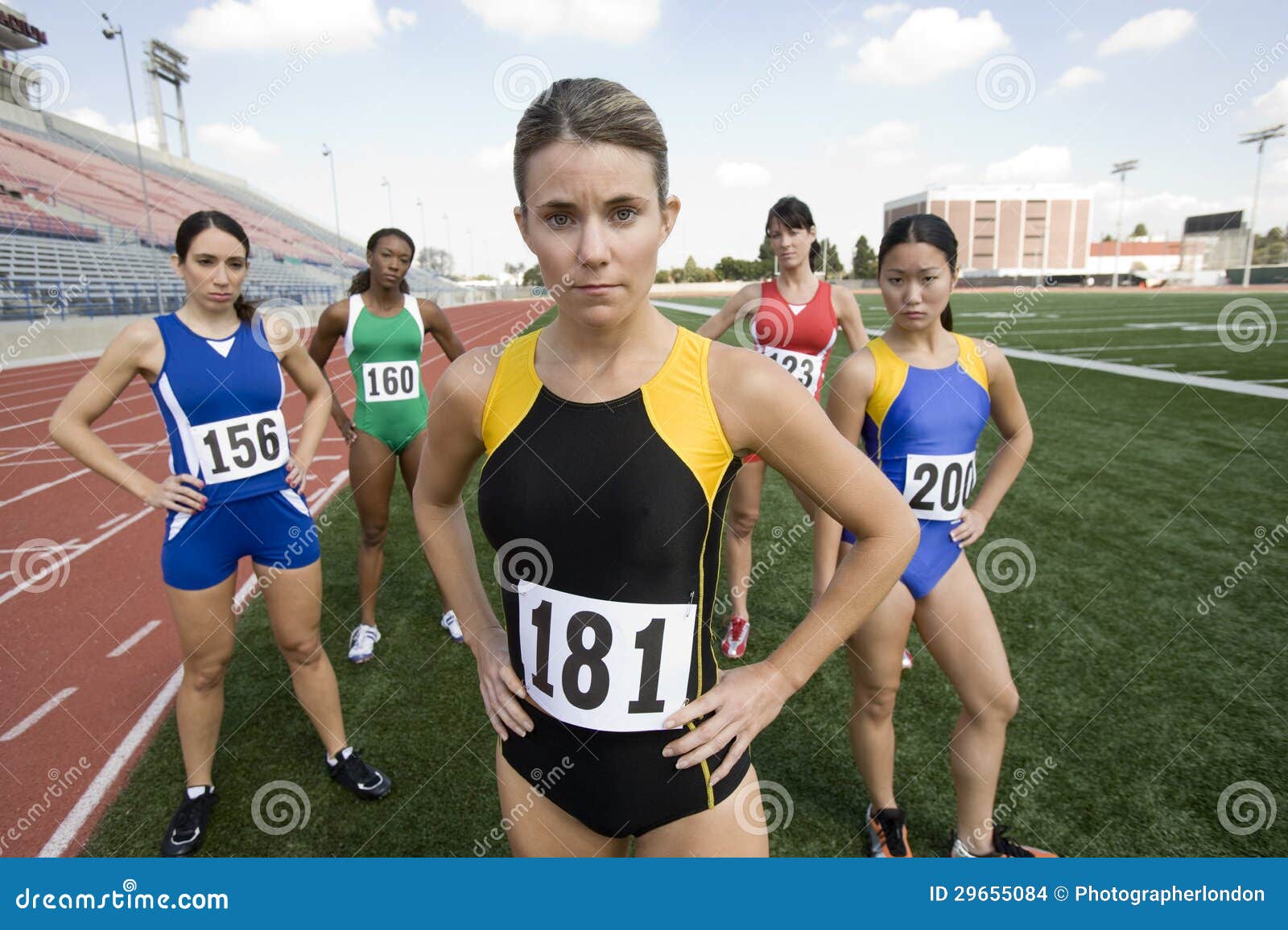 Female Athlete Standing on Field Stock Photo - Image of middle ...