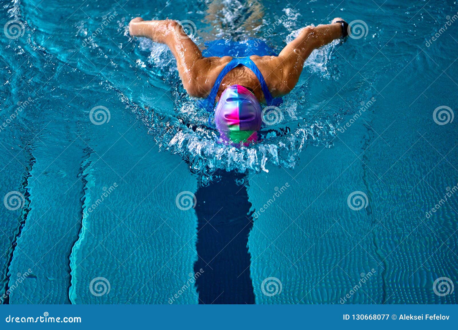 Female Athlete Swims with a Butterfly Style. Stock Image - Image of ... Female Athlete Swims with a Butterfly Style. Stock Image - Image of ...