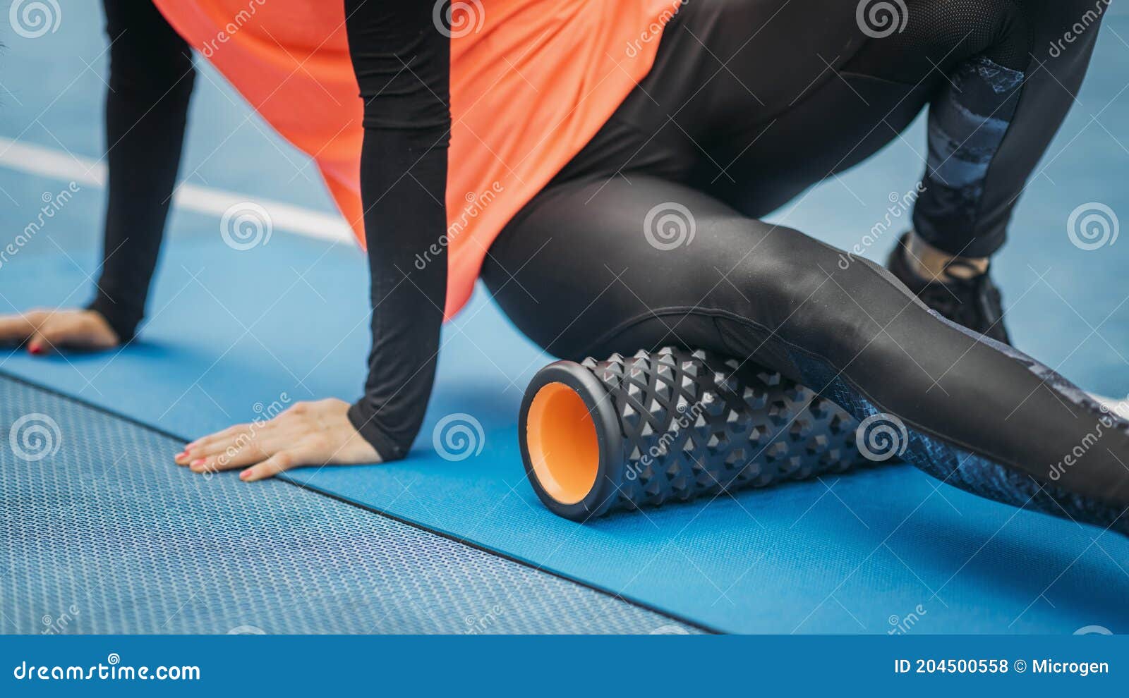 Female Athlete Using Foam Roller Stock Photo - Image of class, foam ...