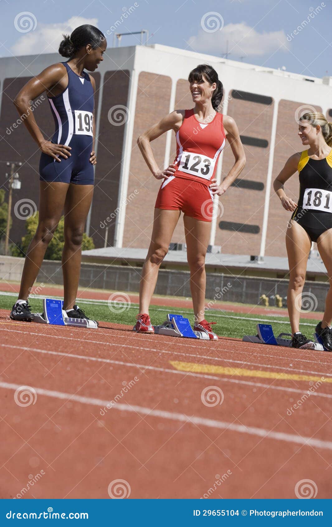 Female Athletes at Starting Blocks Stock Photo - Image of multiracial ...