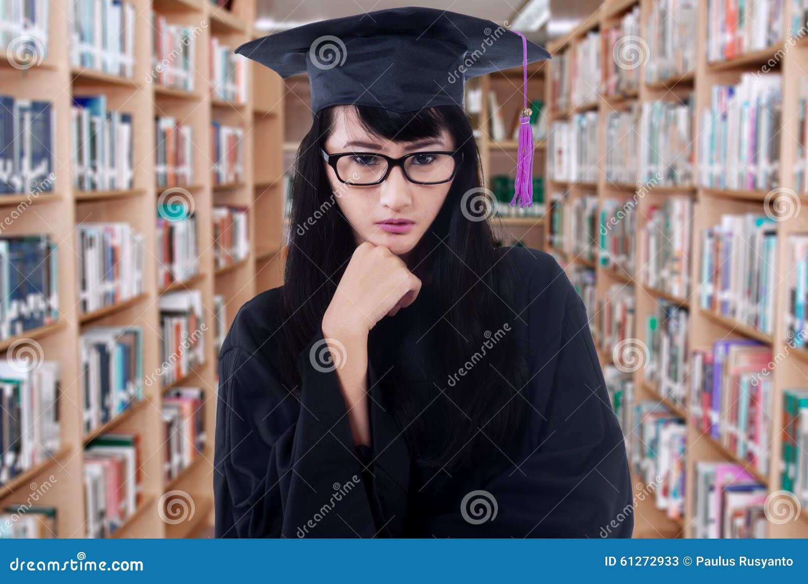 Female Bachelor with a Graduation Cloak in Library Stock Image - Image ...