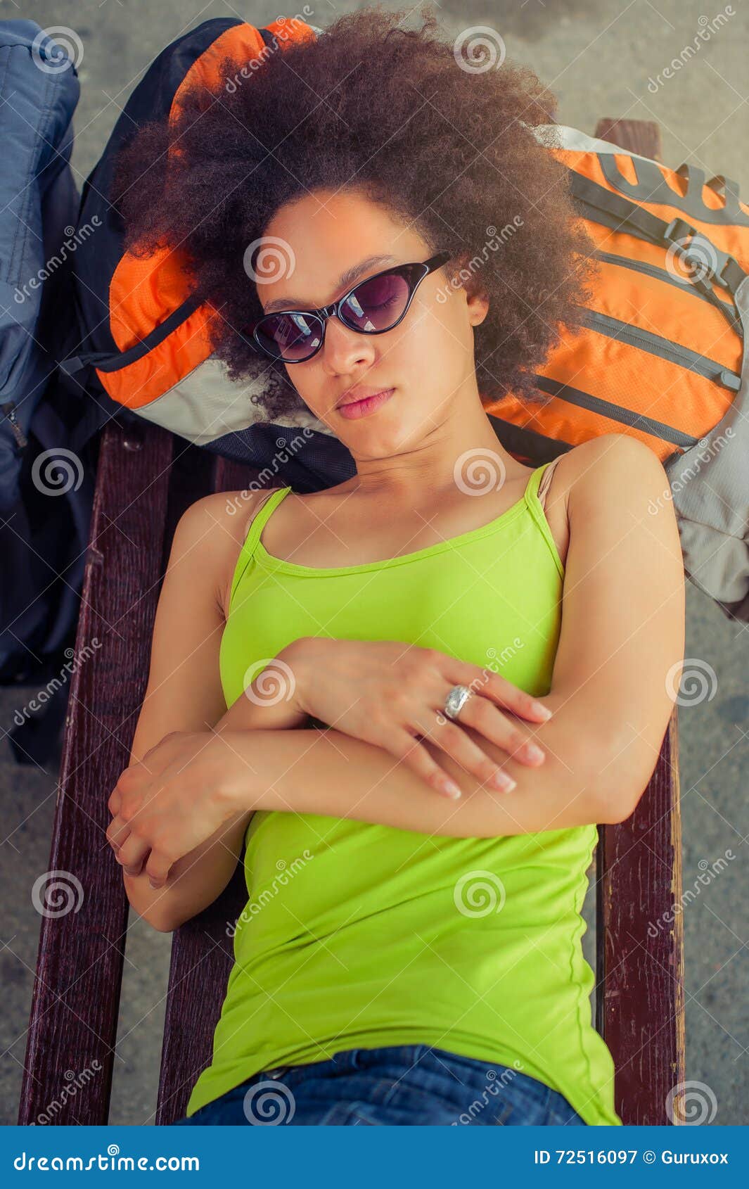 Female Backpacker Tourist Napping on a Bench Stock Image - Image of ...