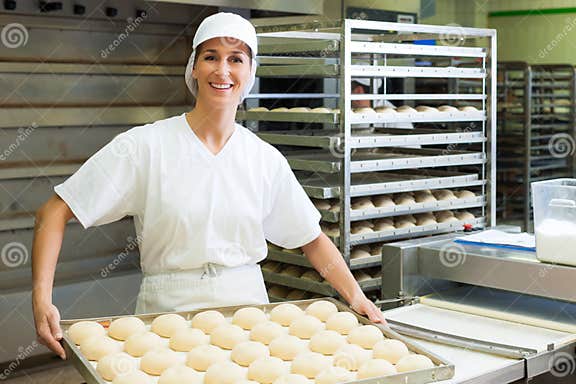 Female Baker Baking Bread Rolls Stock Image - Image of bakery, morning ...