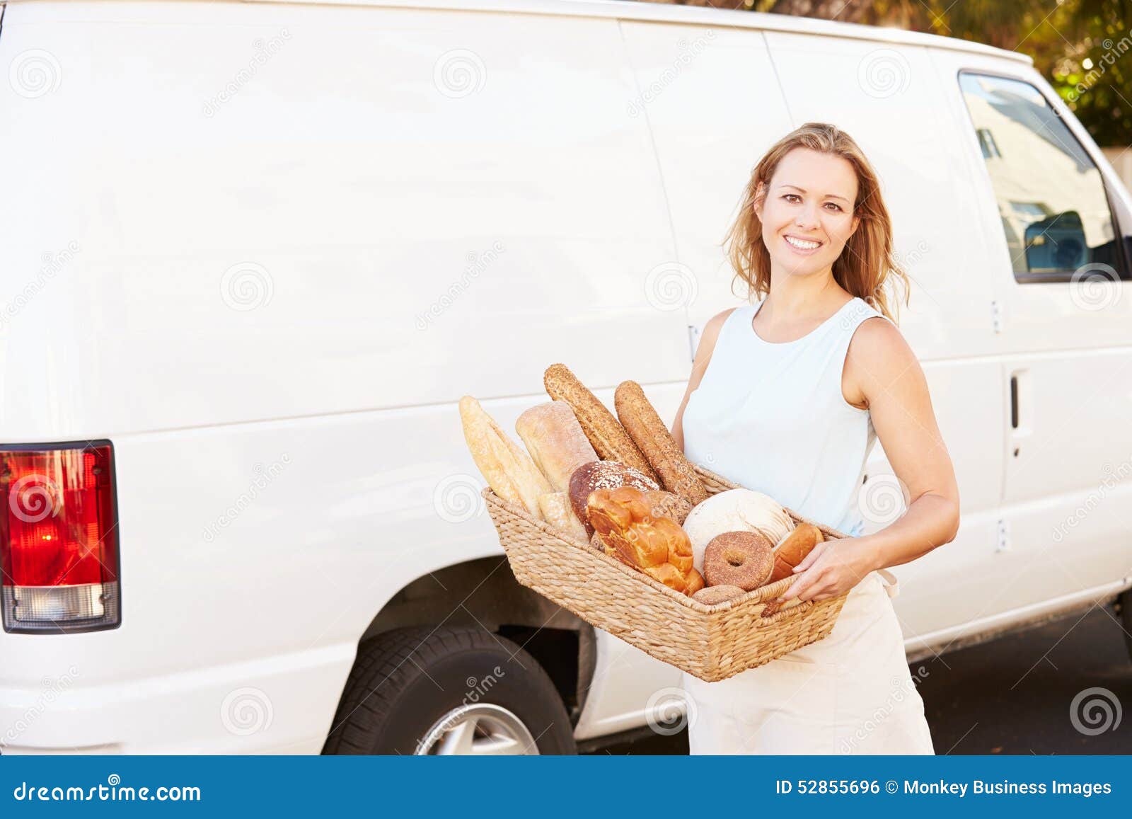 Female Baker Delivering Bread Standing in Front of Van Stock Photo ...