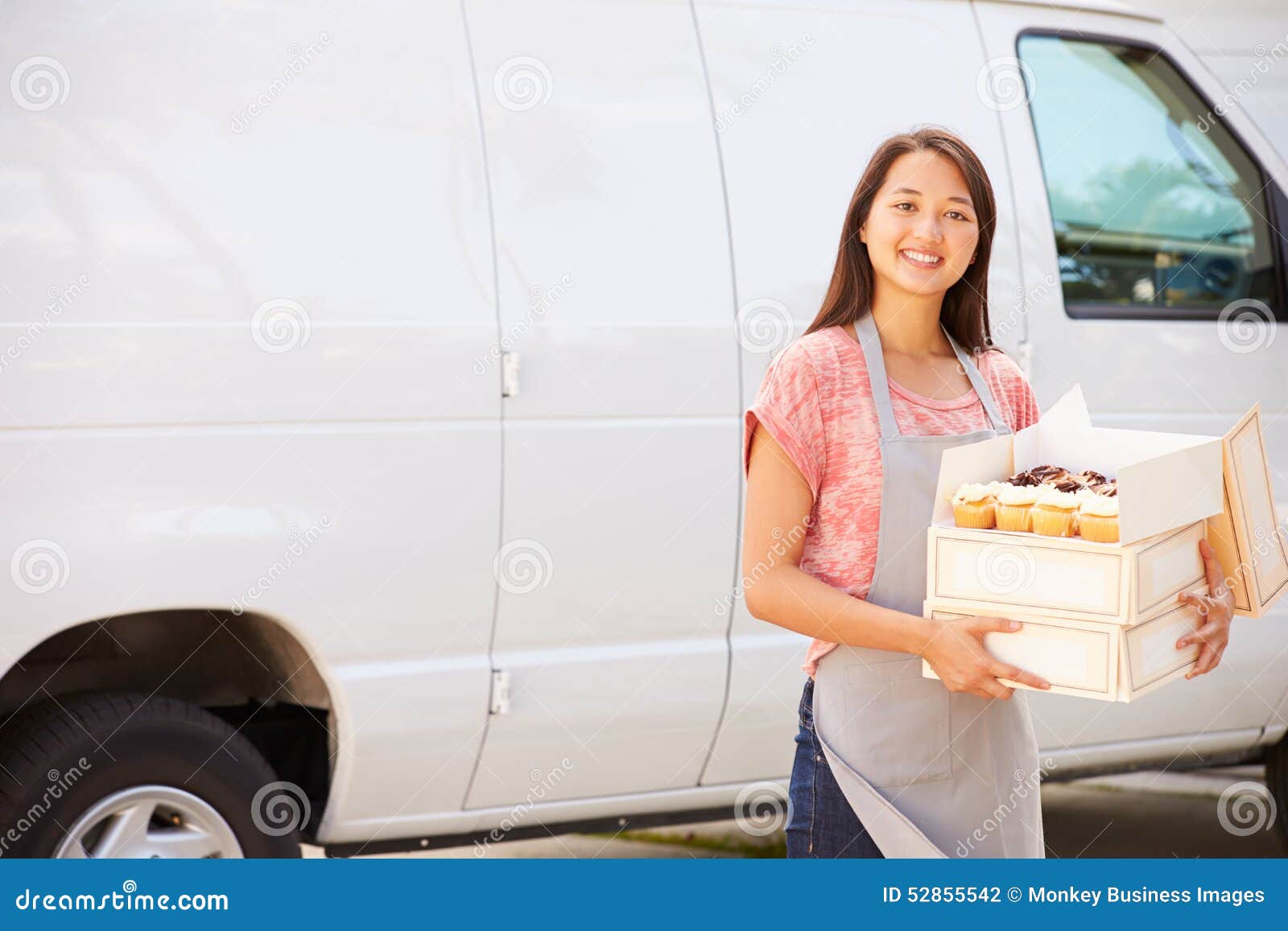 Female Baker Delivering Cakes Standing in Front of Van Stock Photo ...