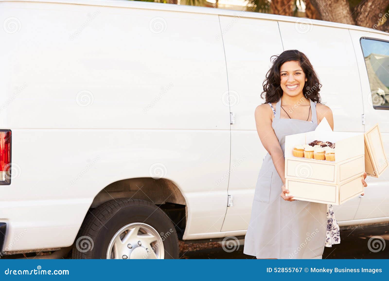 Female Baker Delivering Cakes Standing in Front of Van Stock Image ...