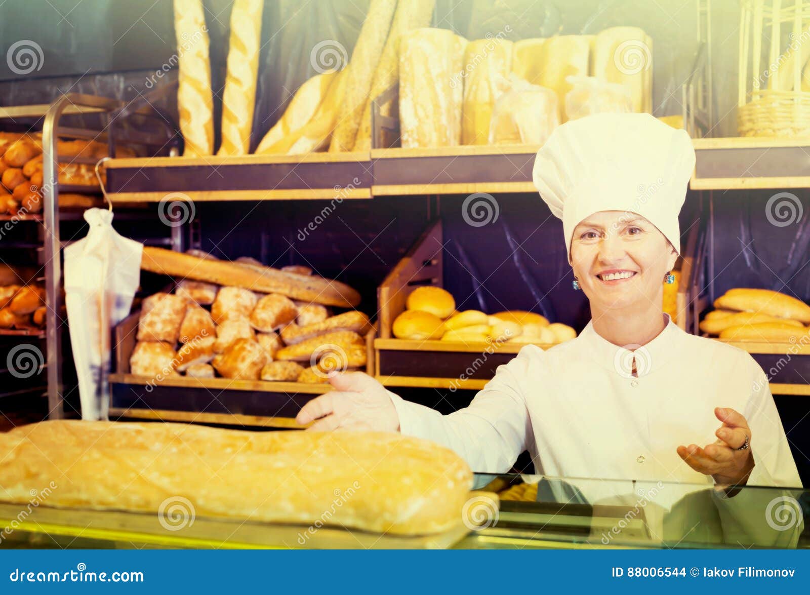 Female Baker with Fresh Bread in Bakery Stock Photo - Image of bread ...