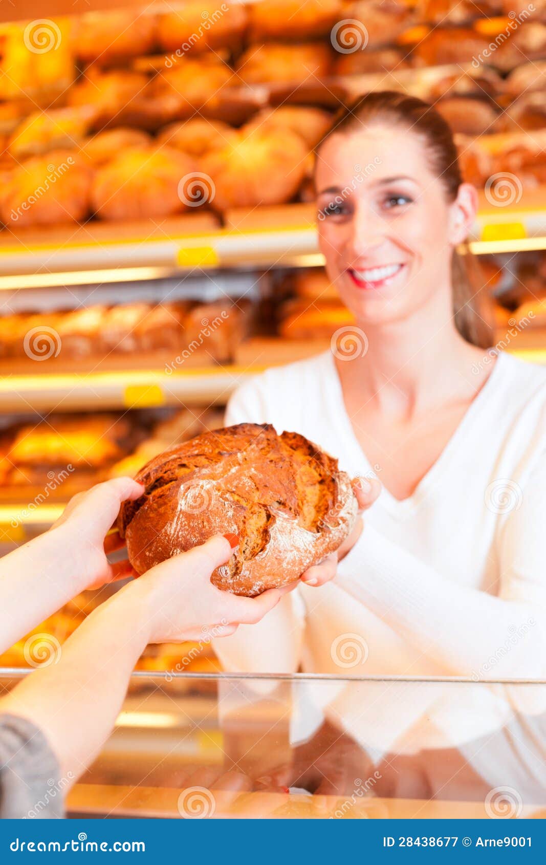 Female baker in her bakery stock image. Image of store - 28438677