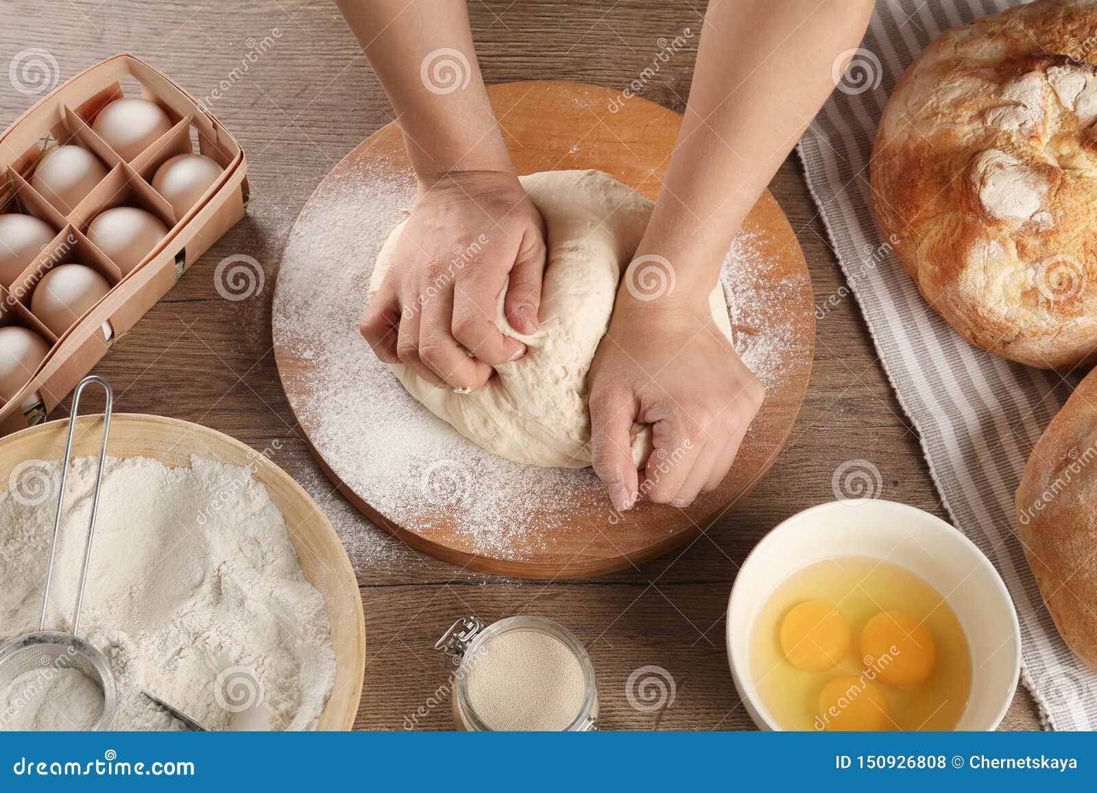 Female Baker Preparing Bread Dough at Kitchen Table Stock Photo - Image ...