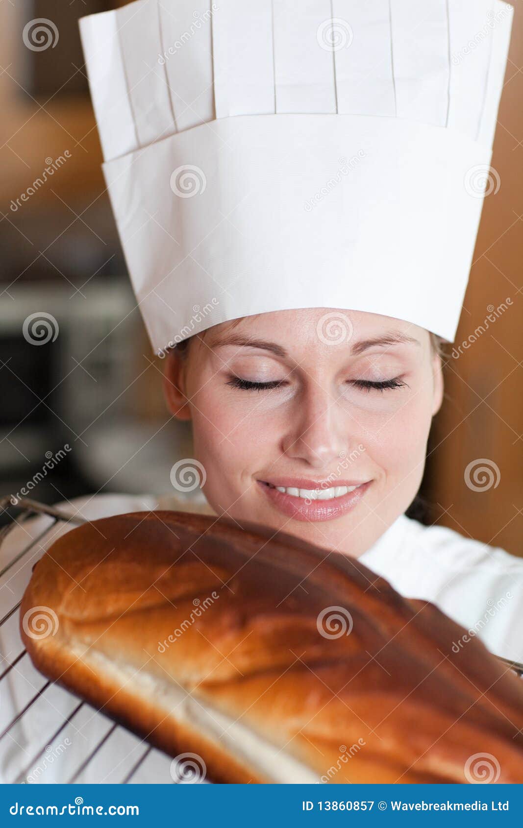 Female Baker Smelling a Bread Stock Image - Image of working, enjoying ...