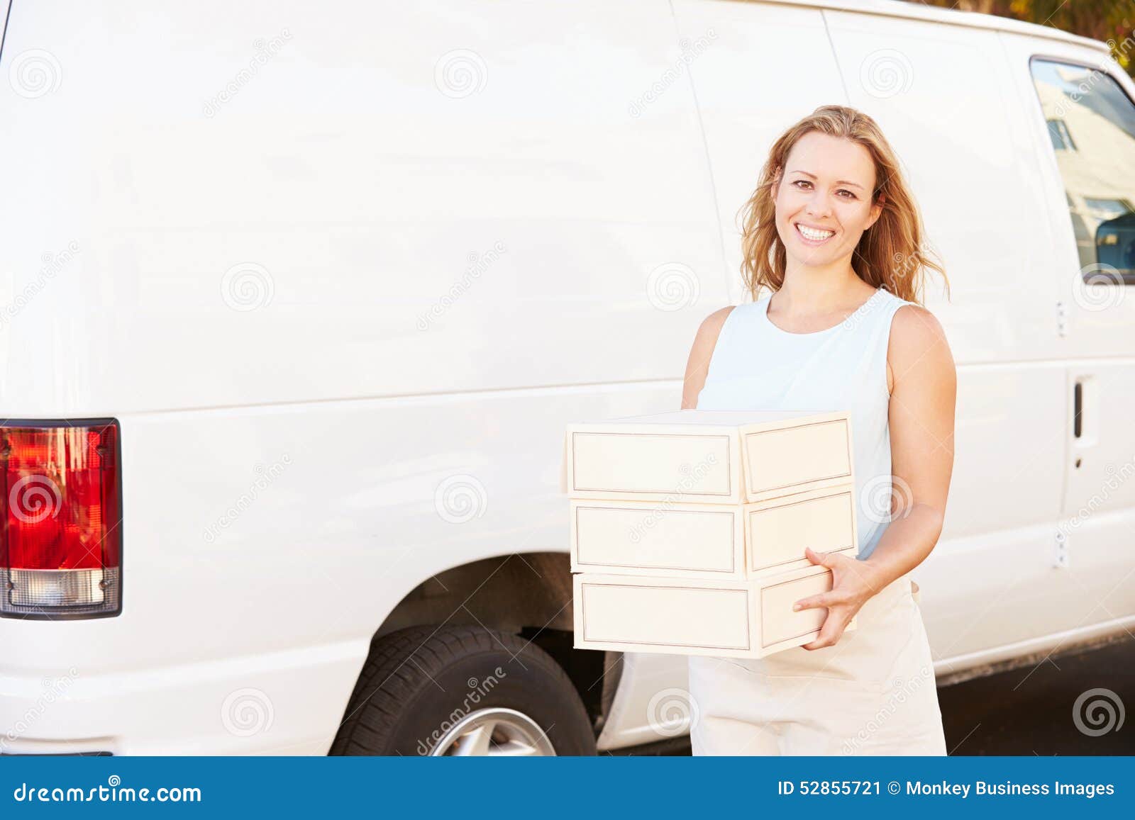 Female Baker Unloading Cakes from Van Stock Image - Image of person ...