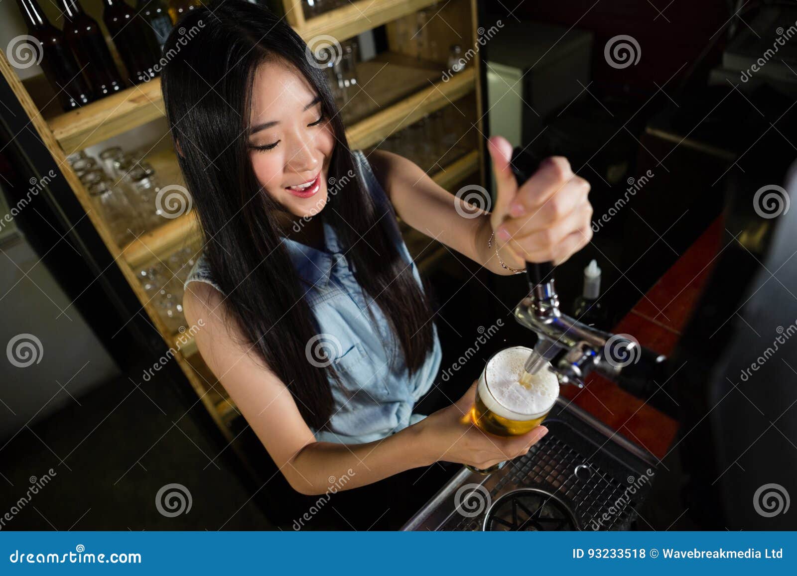 Female Bartender Preparing Drink at Counter Stock Photo - Image of ...
