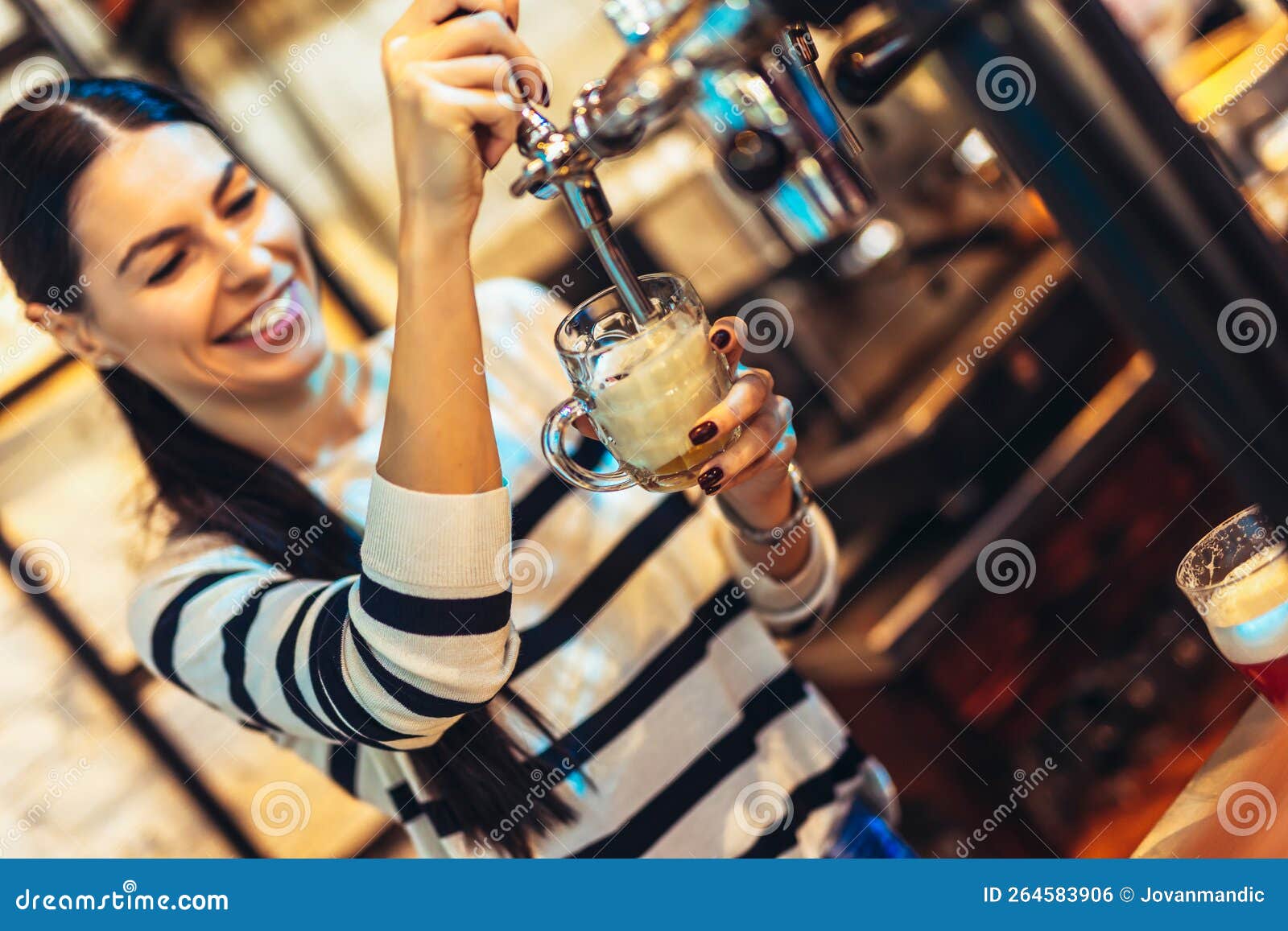 Female Bartender Tapping Beer in Bar Stock Photo - Image of female ...