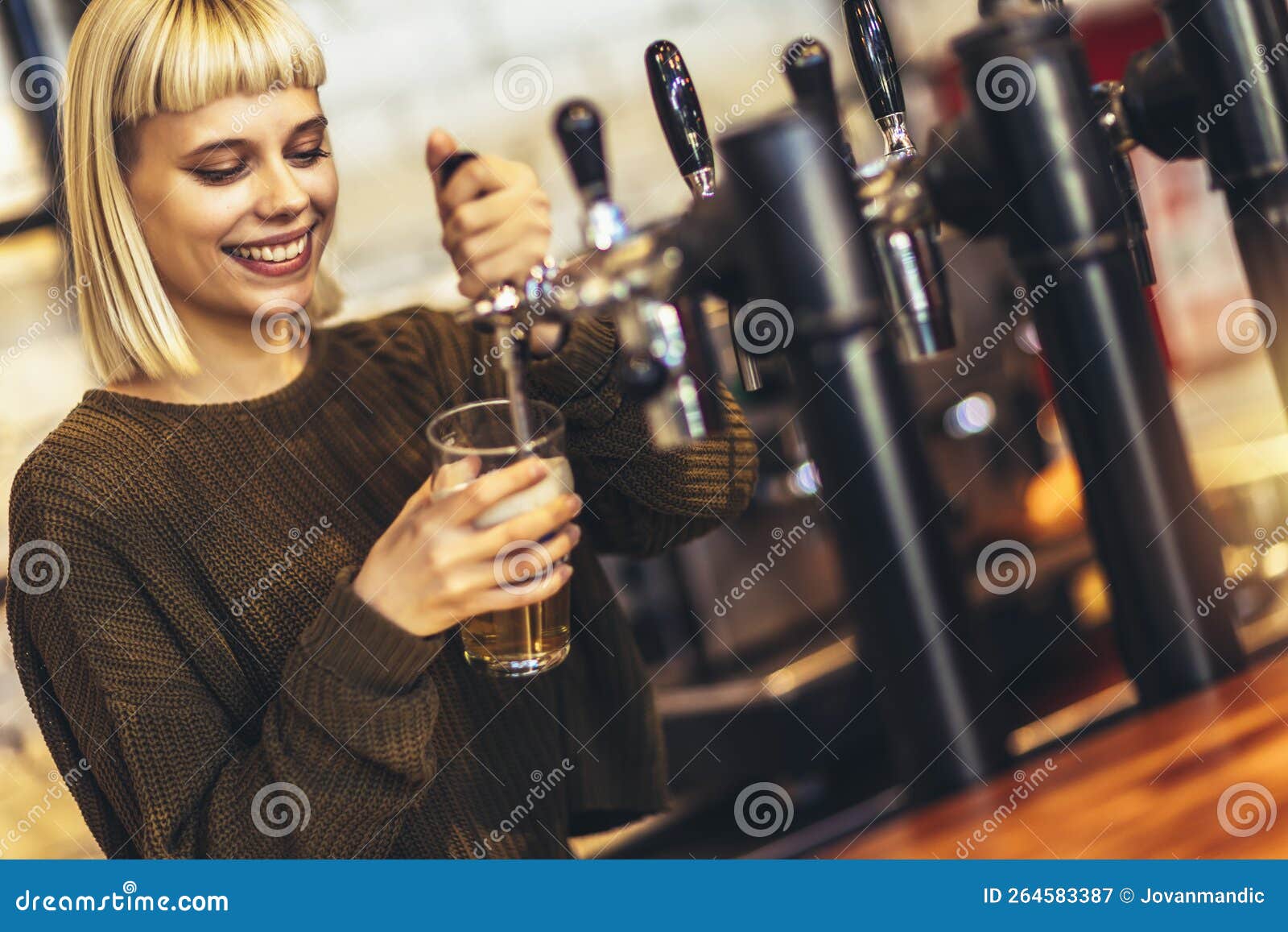 Female Bartender Tapping Beer in Bar Stock Image - Image of alcoholic ...