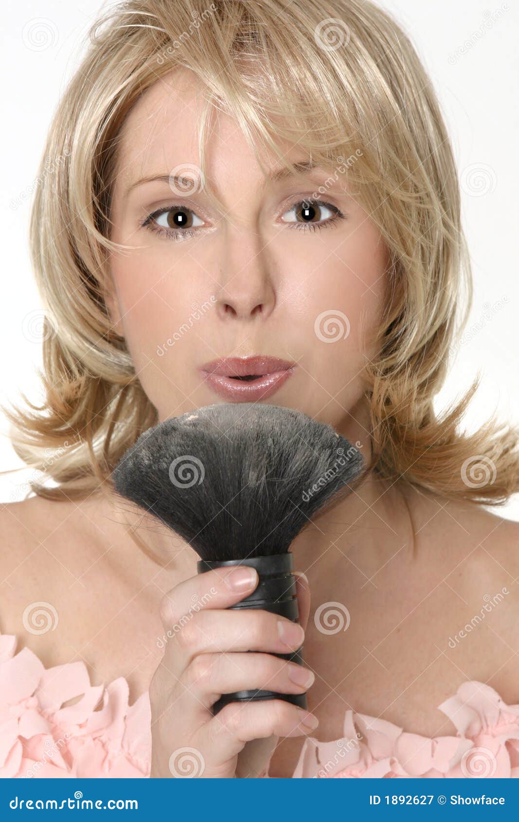 Female Blowing Excess Powder from Makeup Brush Stock Image - Image of ...