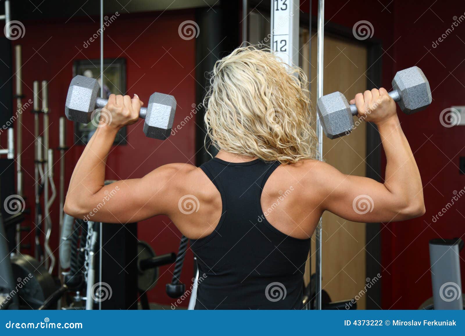 Female Bodybuilder Maria Mikola Reflects Her Flexed Muscles Stock Image ...