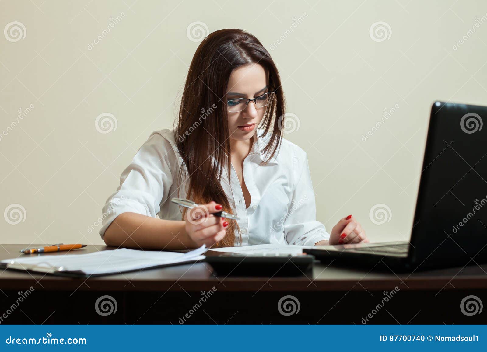 Female Bookkeeper in Glasses Using Laptop Stock Photo - Image of lady ...