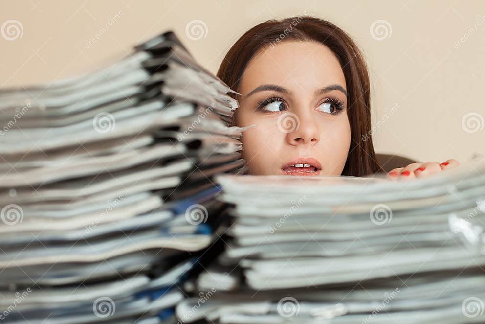 Female Bookkeeper with Large Stacks of Documents Stock Photo - Image of ...