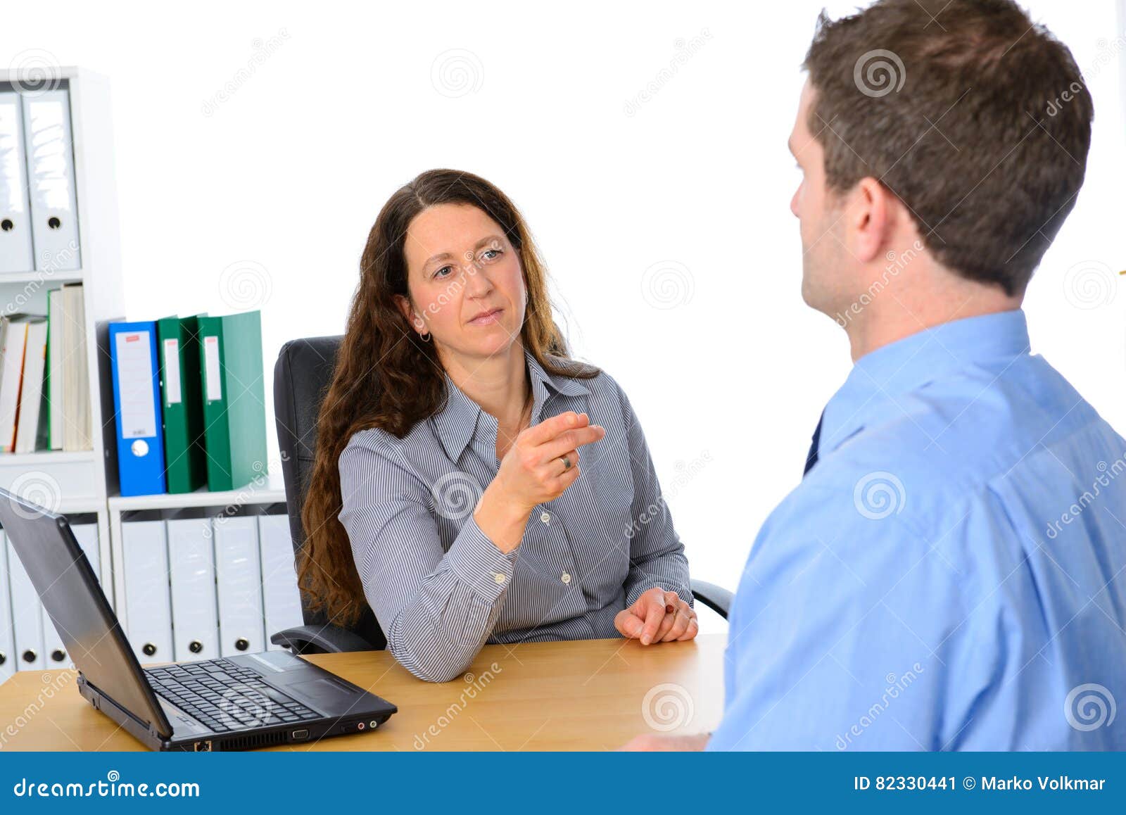 Female Boss in Serious Conversation with Clerk Stock Image - Image of ...