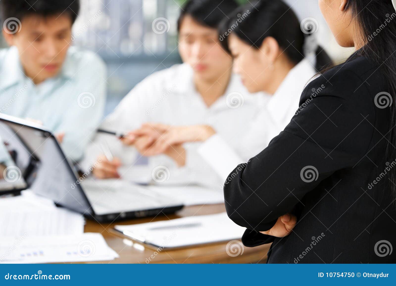Female Boss Watching Her Employees Working Stock Photo - Image of ...