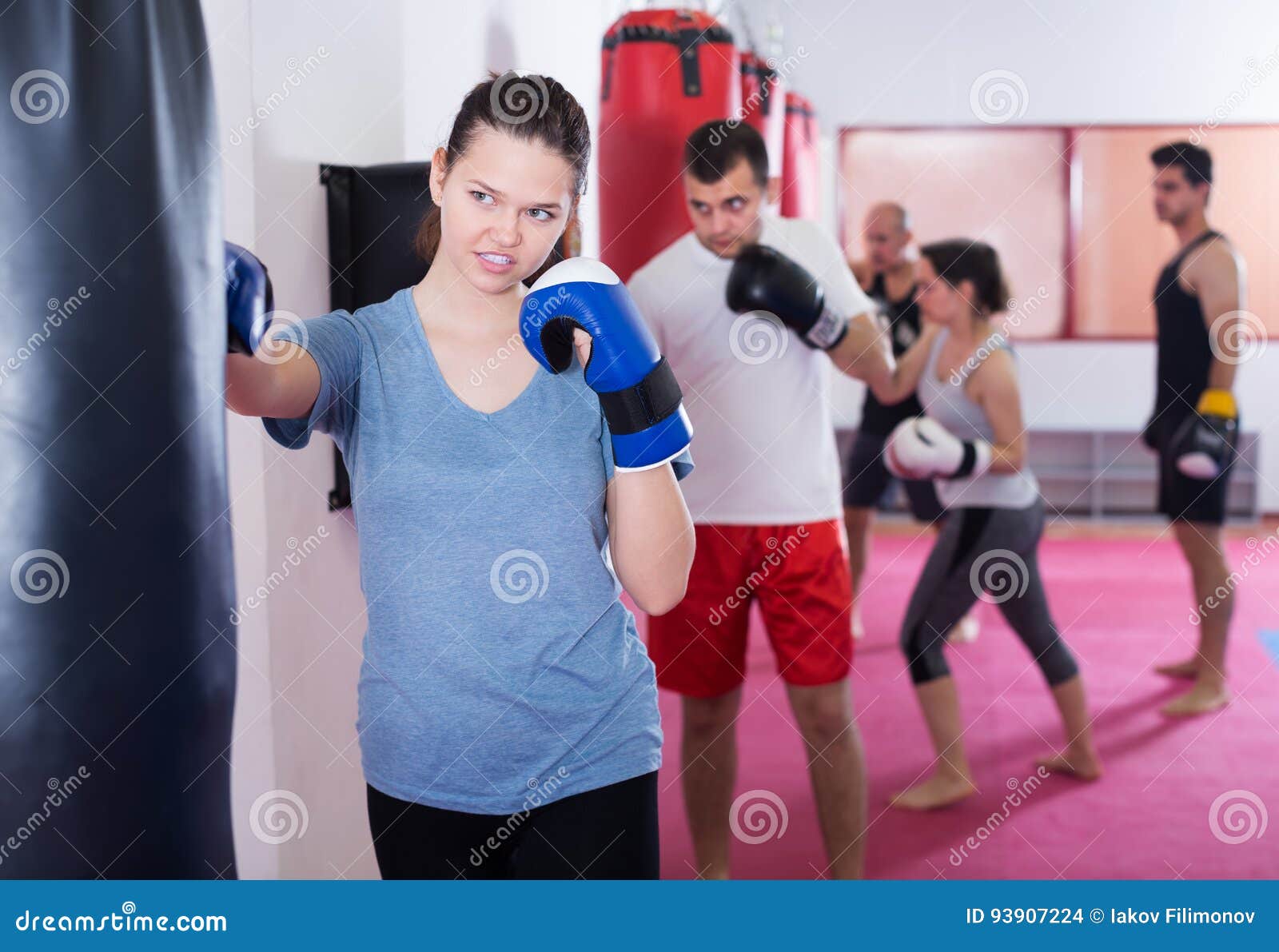 Female Boxer Beating Boxing Bag Stock Photo - Image of ring, hook: 93907224