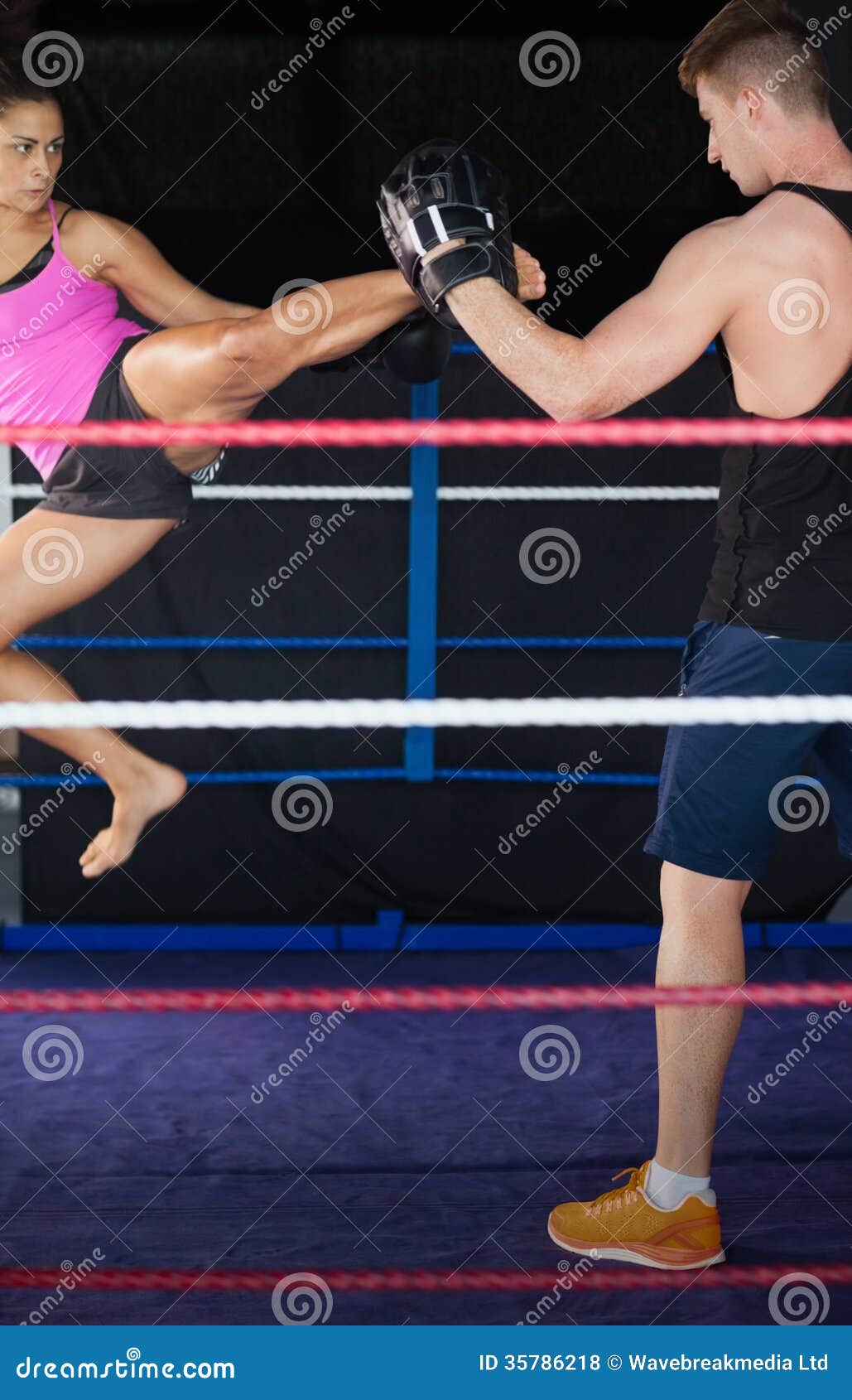 Female Boxer Practicing an Air Kick Stock Photo - Image of competition ...