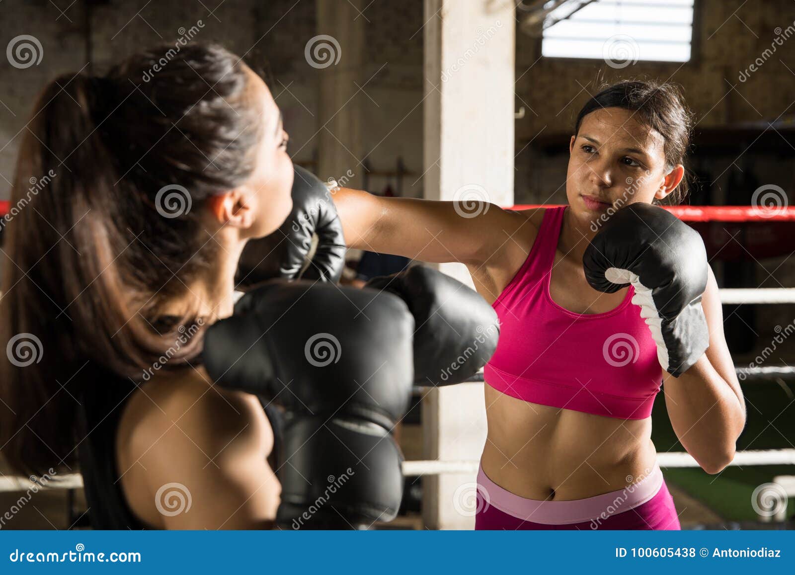 Female Boxer Punching Her Opponent Stock Photo - Image of ring, boxer ...