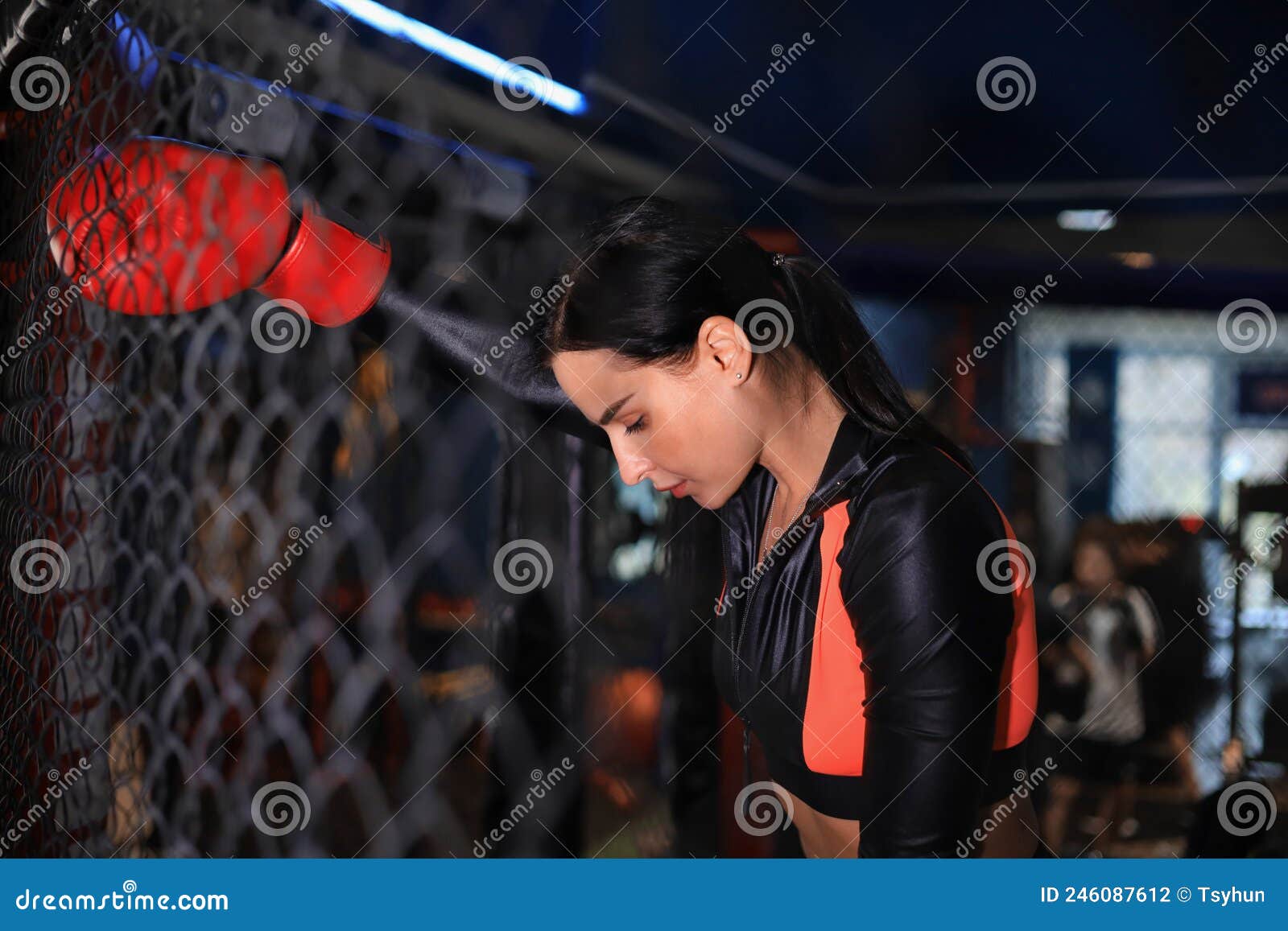 Female Boxer Standing Inside a Boxing Cage. Stock Photo - Image of ...