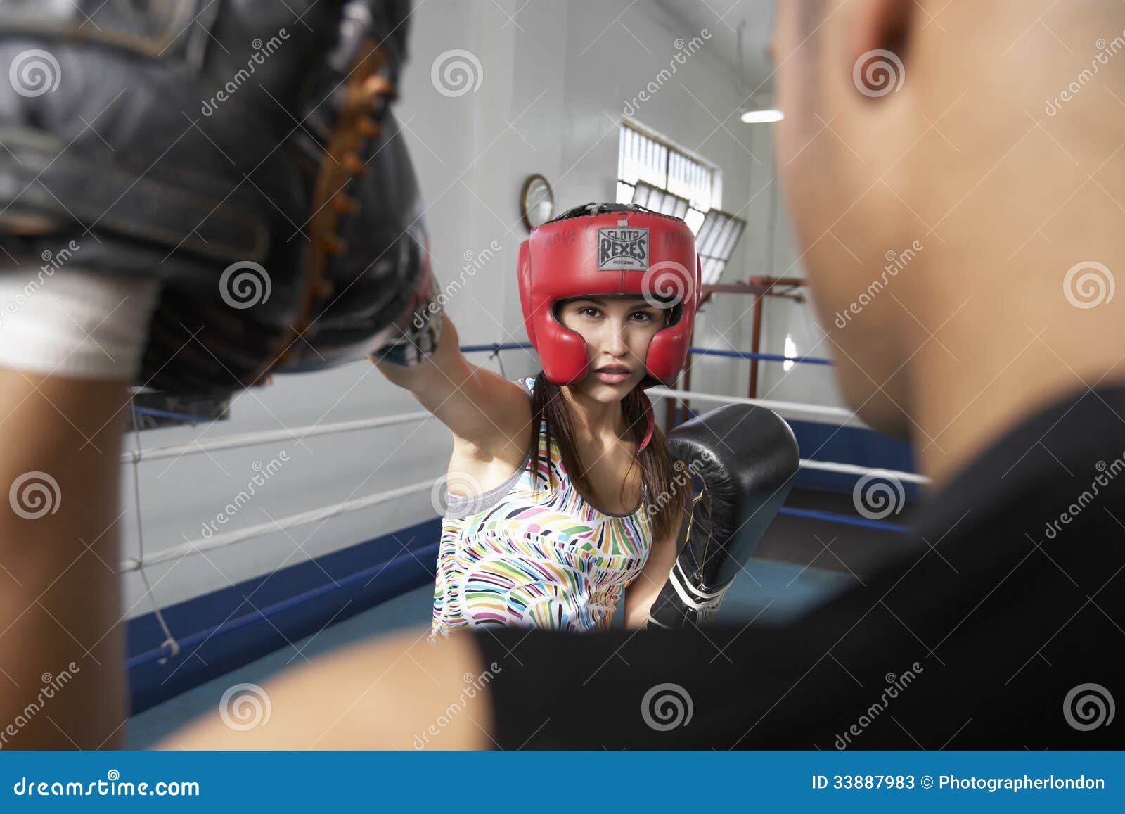 Female Boxer Striking Her Target in Ring Stock Image - Image of boxer ...