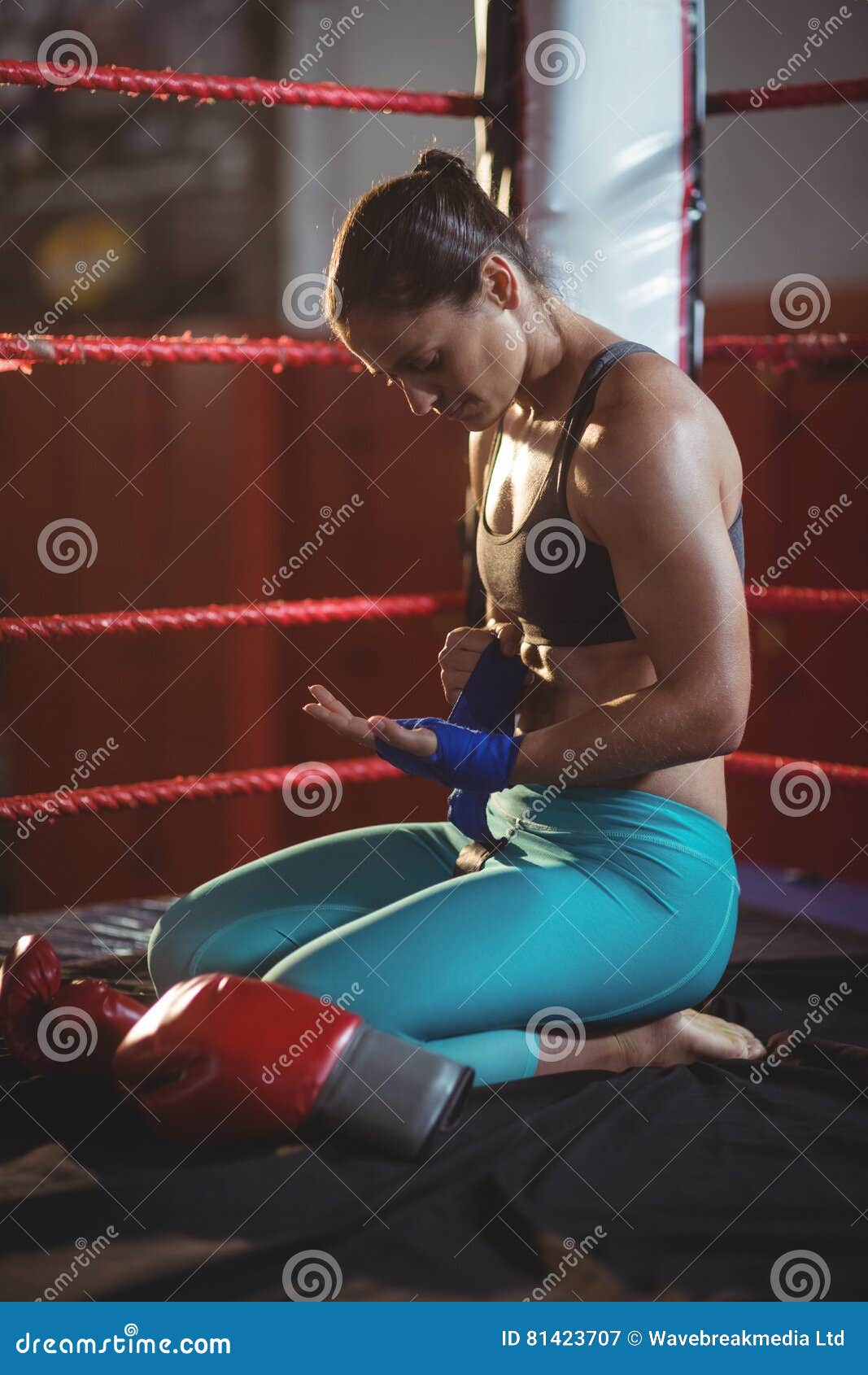 Fit Female Strap On Her Wrist And Exercise Hard To Strengthen Muscle ...