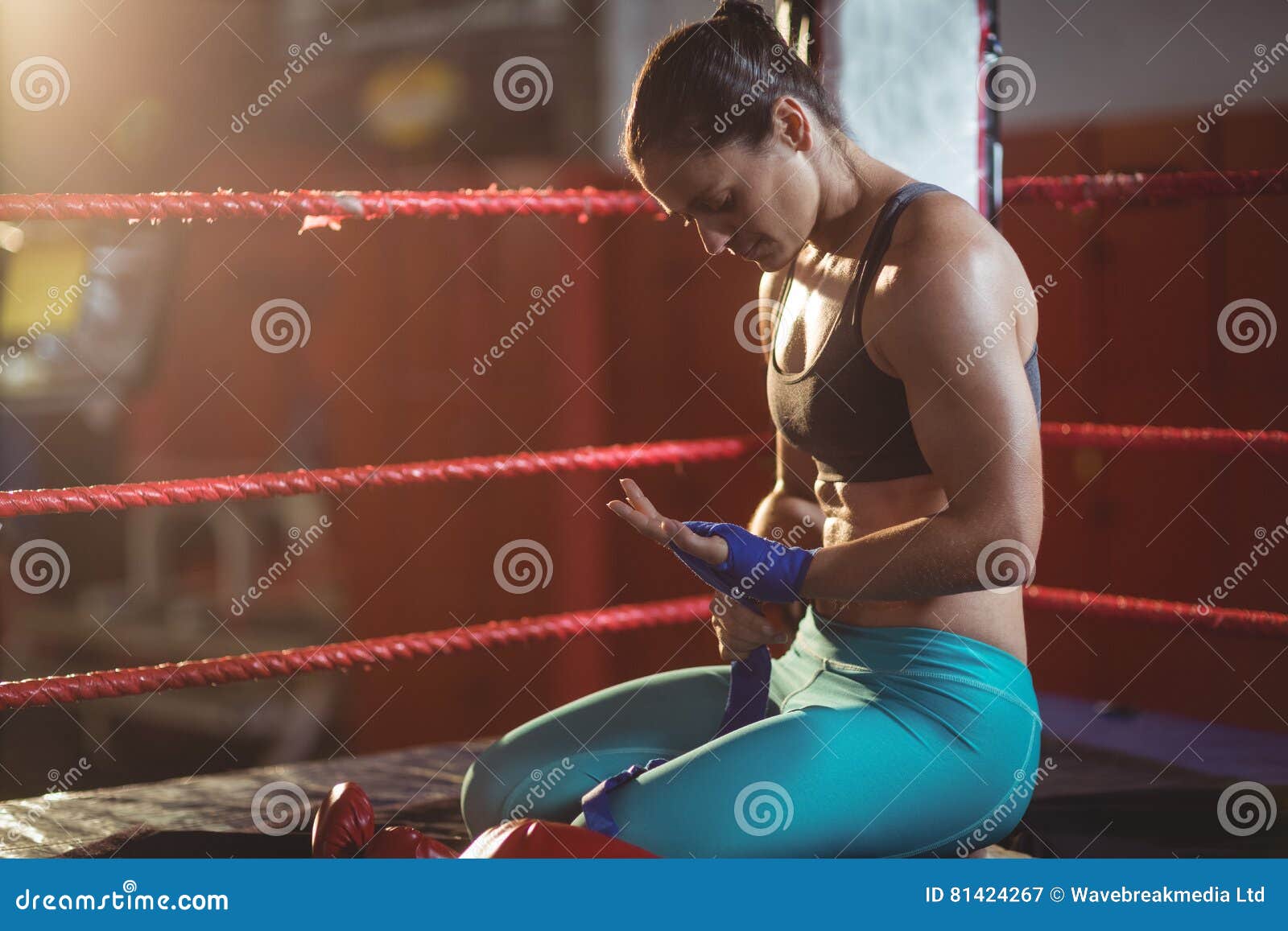 Fit Female Strap On Her Wrist And Exercise Hard To Strengthen Muscle ...