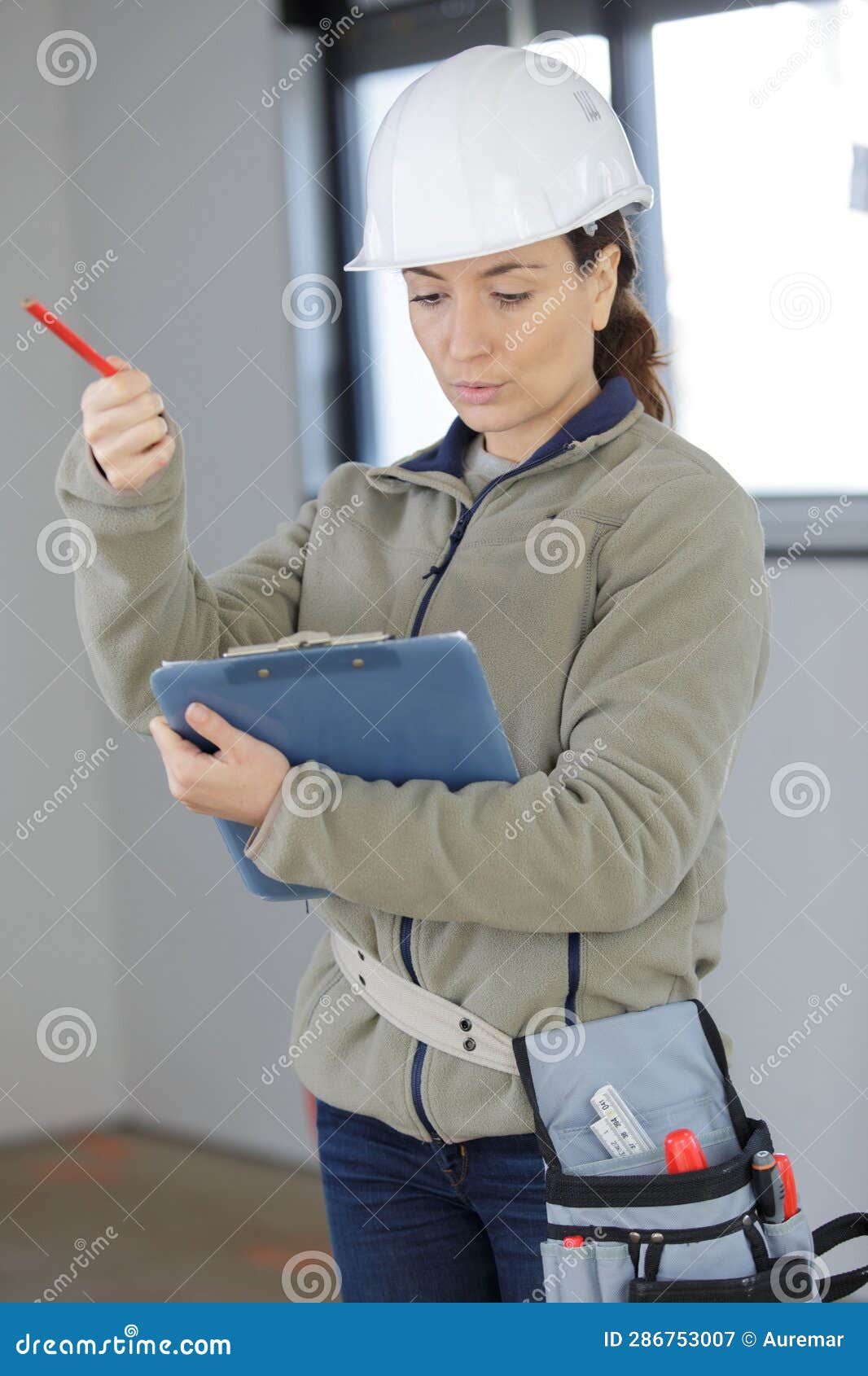Female Builder with Clipboard Stock Image - Image of manual, repairman ...
