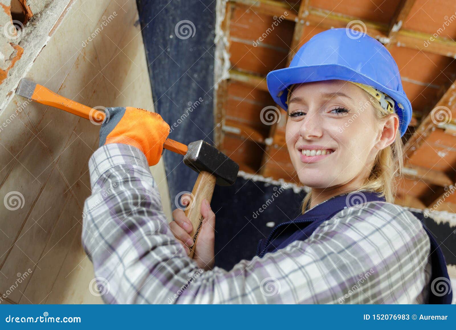 Female Builder Holding Hammer Stock Image - Image of safety, equipment ...