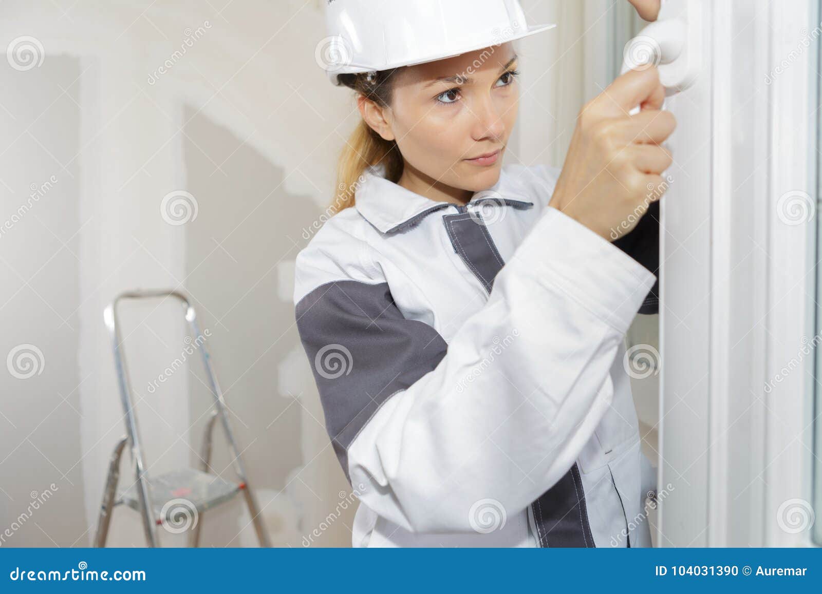 Female Builder Installing Window in Building Stock Photo - Image of ...