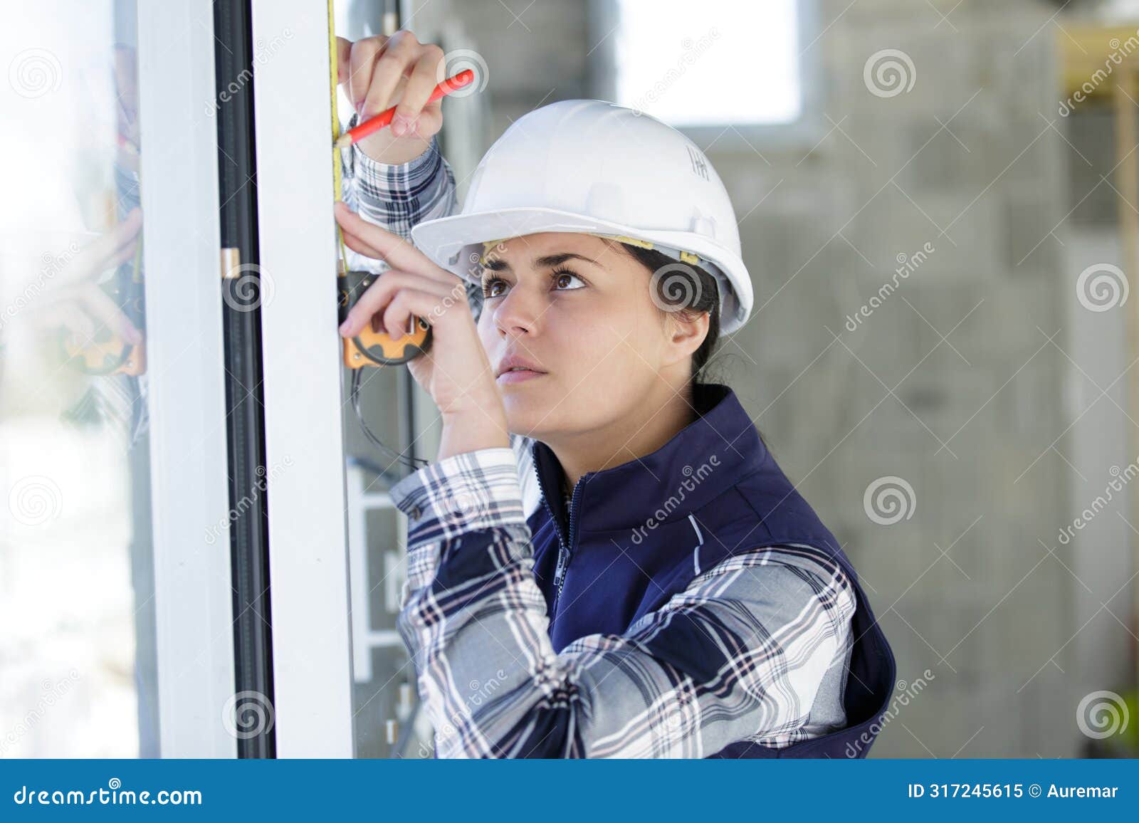 Female Builder Looking at Windows Stock Image - Image of profession ...