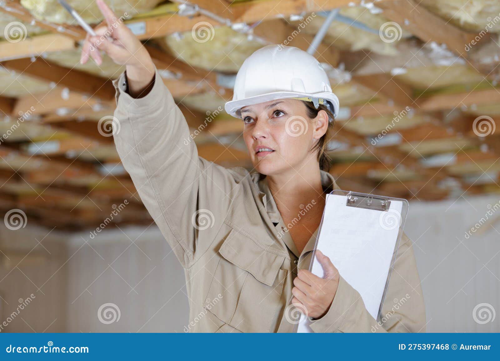 Female Builder Pointing Up for Something Stock Photo - Image of female ...