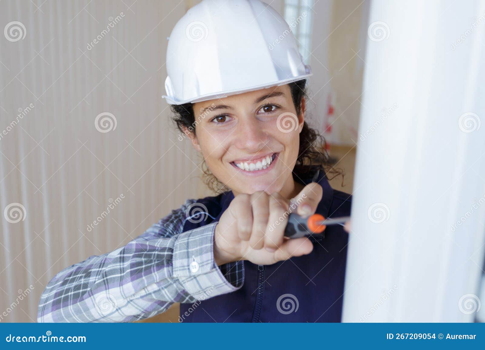 Female builder with tools stock photo. Image of equipment - 267209054