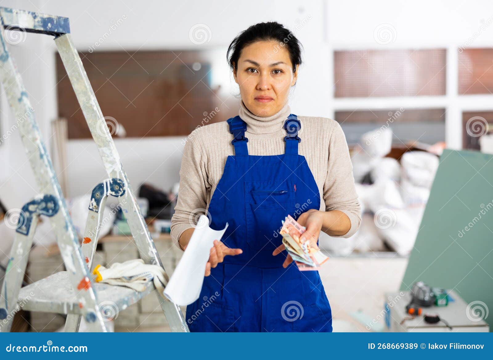 Female Builder is Unhappy with the Money Received for Work Done Stock ...