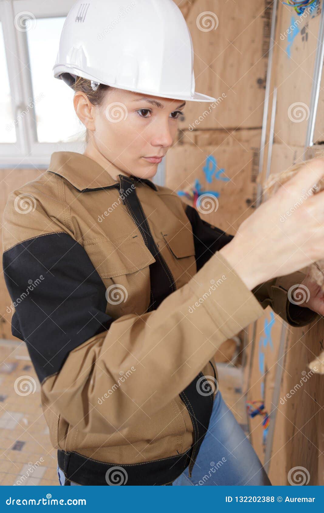 Female Builder Working on Insulation Wall Stock Photo - Image of ...