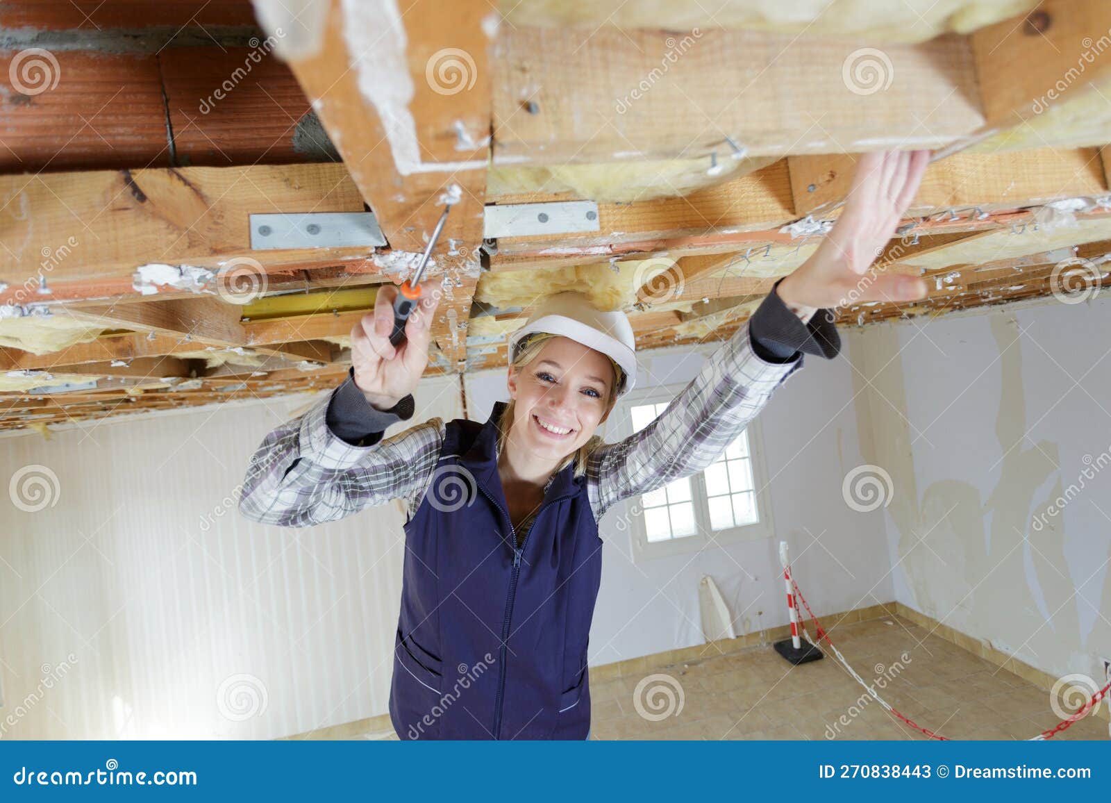 Female Builder Working on Wooden Ceiling Joists Stock Image - Image of ...