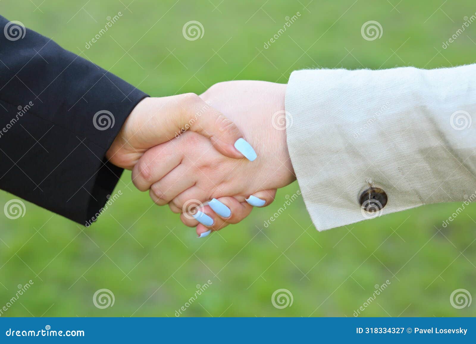 Female Business Handshake in Front of Green Stock Image - Image of button, beige: 318334327