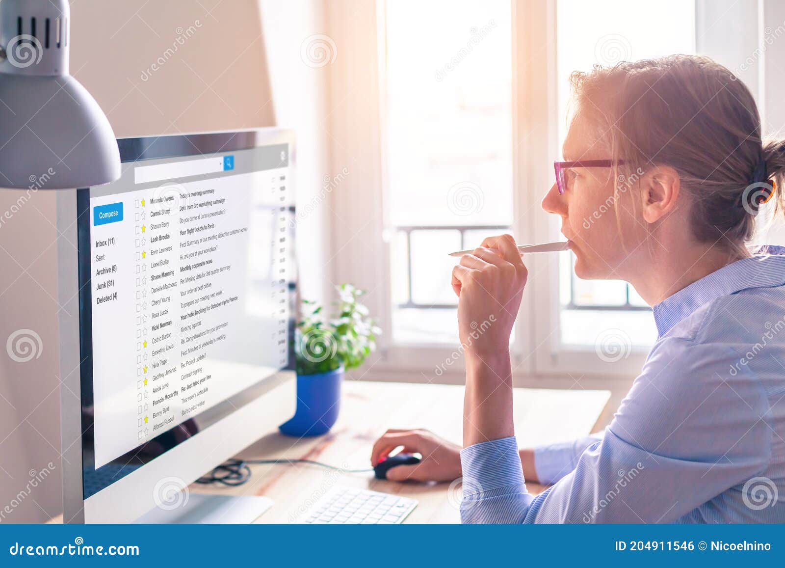 Female Business Person Reading Email on Computer Screen at Work Stock ...