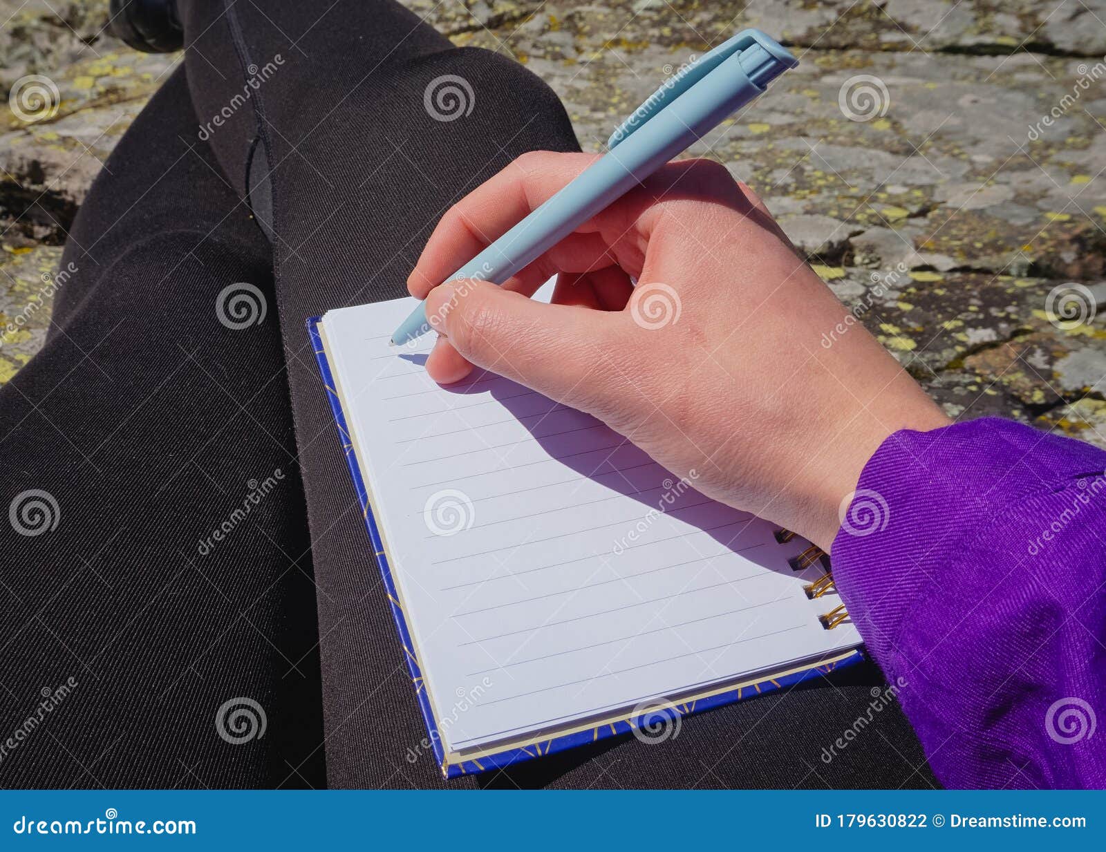 A Female Businesswoman Writing Outside Stock Photo - Image of bike ...