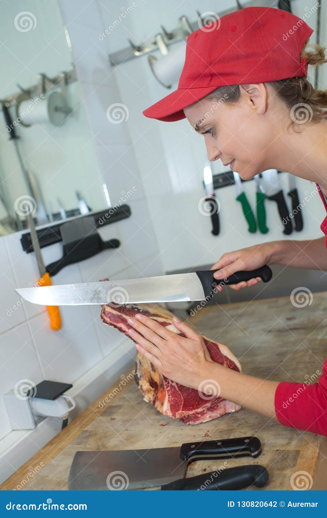 Female Butcher Cutting Meat Stock Photo - Image of action, housewife ...