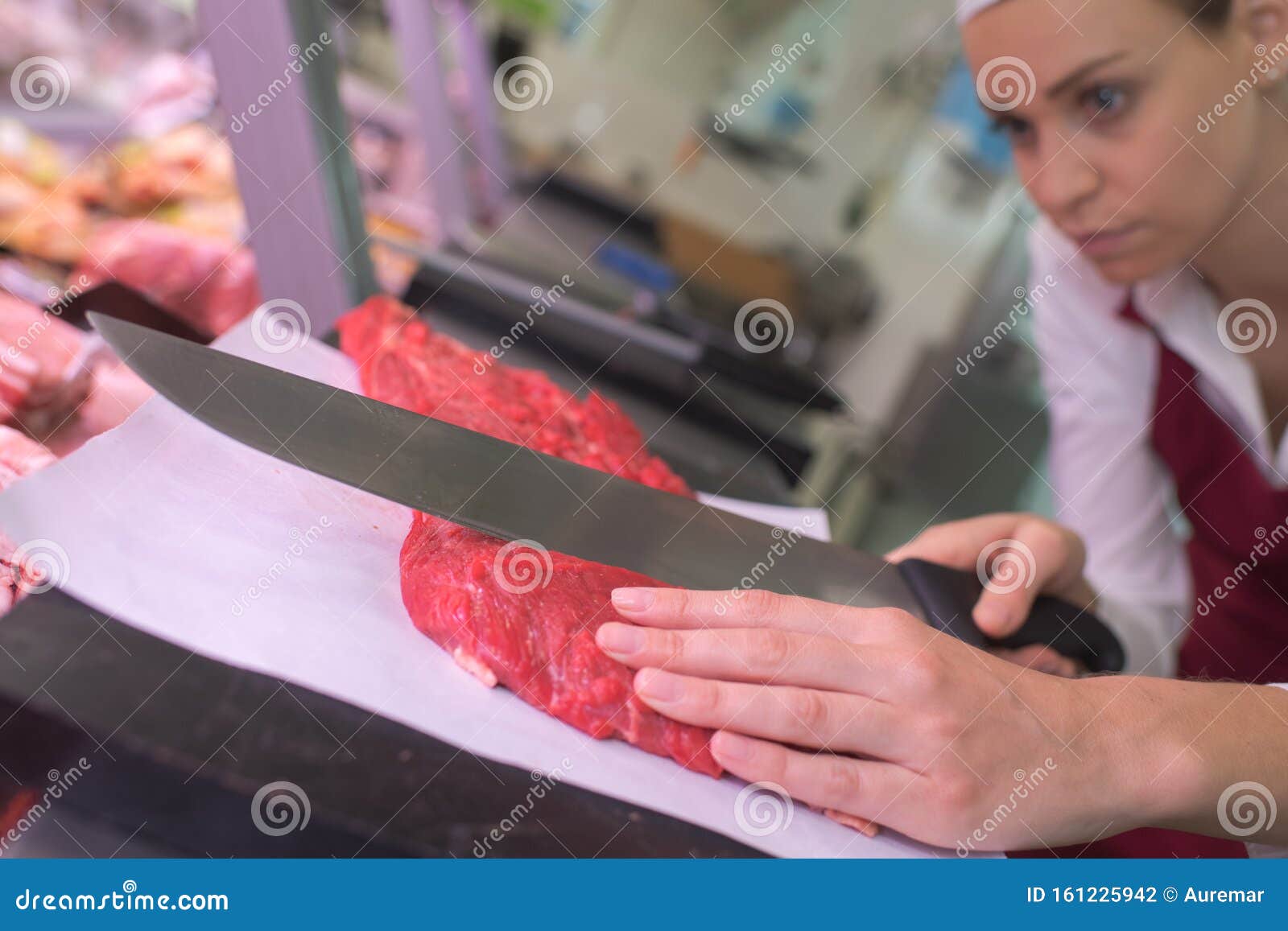 Female Butcher Cutting Meat Stock Photo - Image of woman, shop: 161225942