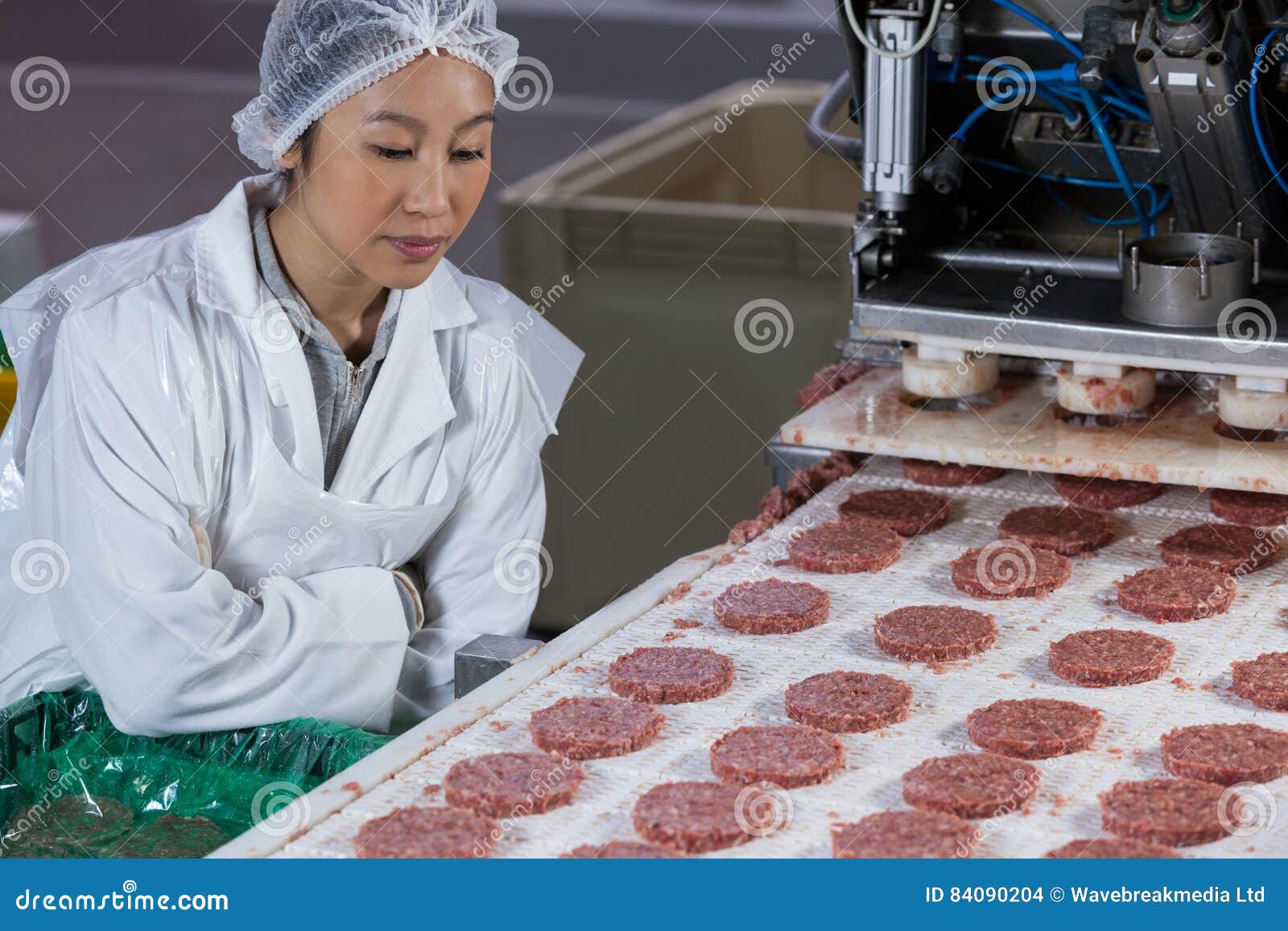 Female Butcher Processing Hamburger Patty Stock Photo - Image of ...