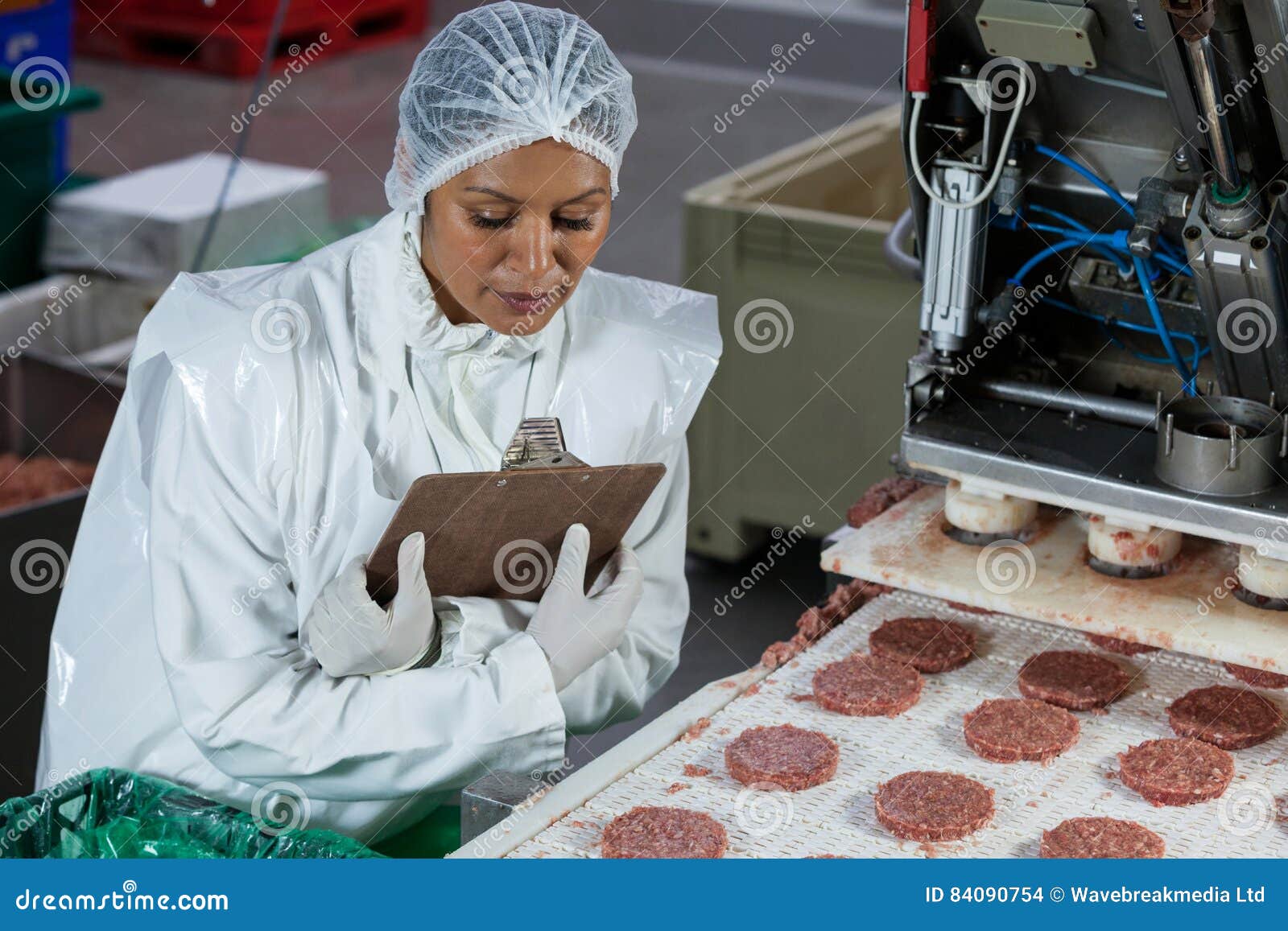 Female Butcher Processing Hamburger Patty Stock Photo - Image of female ...